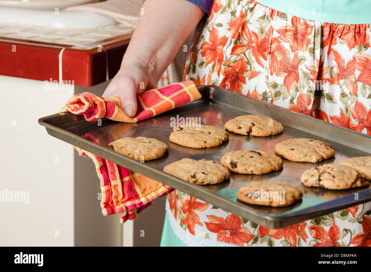 Woman taking golden baked hi-res stock photography and images - Alamy