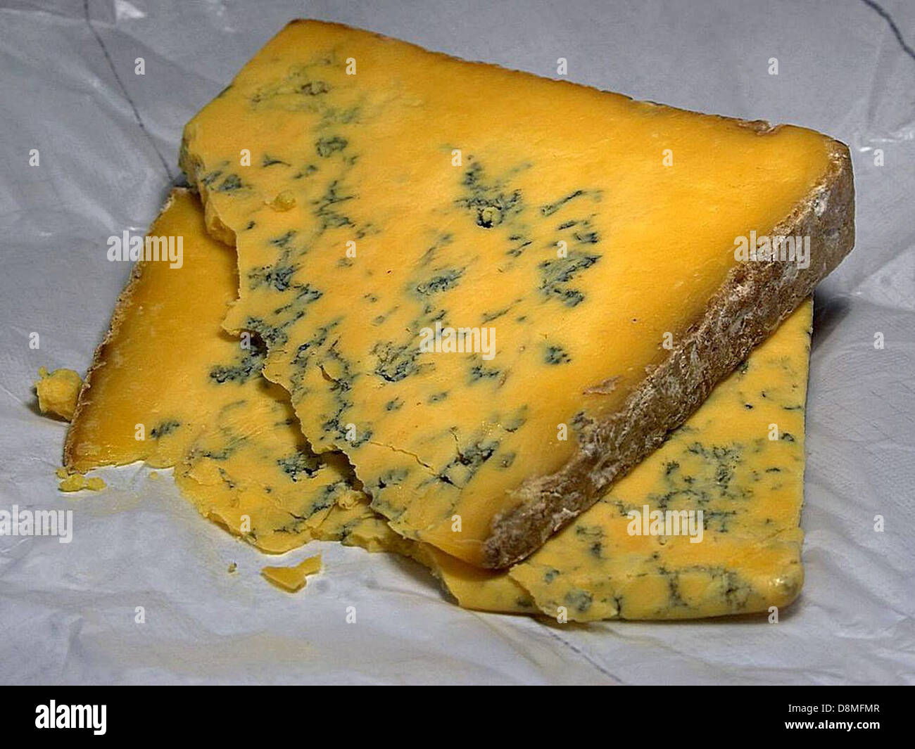 Shropshire Blue cheese is a blue-veined, semi-soft cheese known for its ...