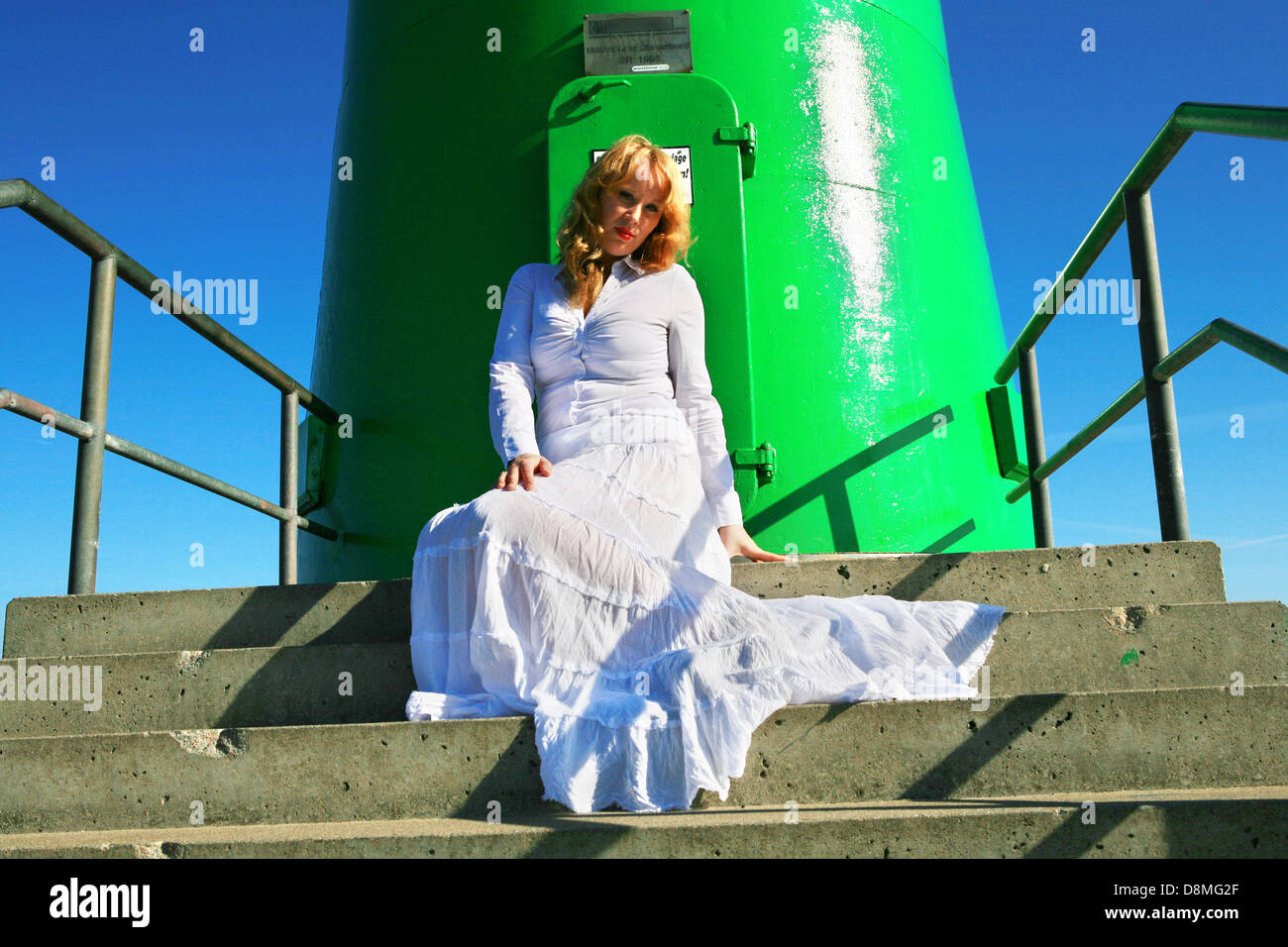 redheaded woman at a lighthouse Stock Photo - Alamy