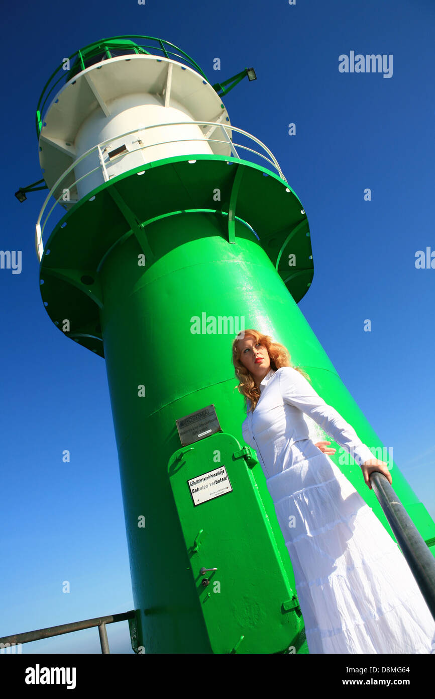 redheaded woman at a lighthouse Stock Photo - Alamy