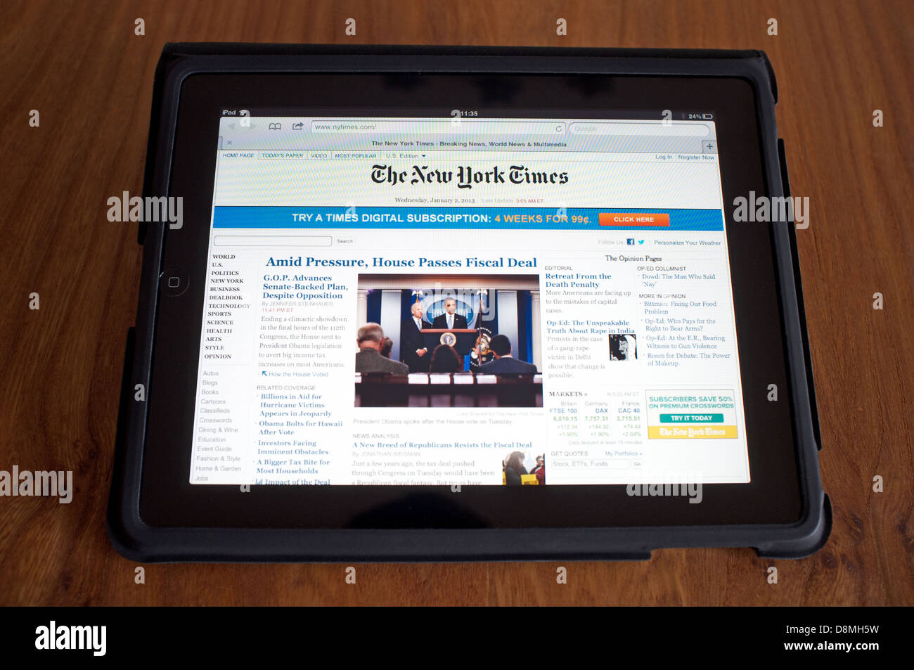 New York Times electronic edition displayed on Apple iPad Stock Photo ...