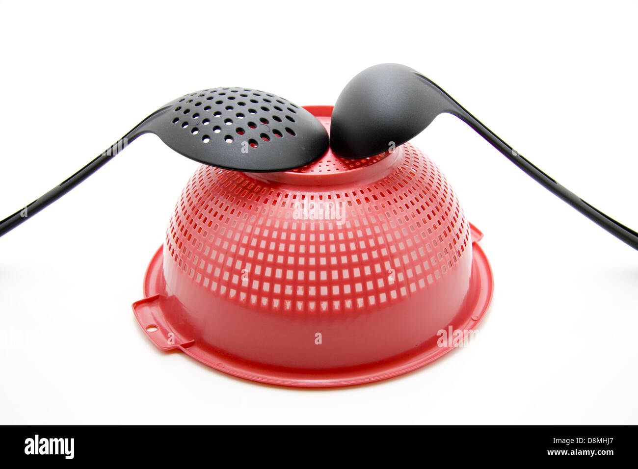 Ladle on sieve Stock Photo - Alamy