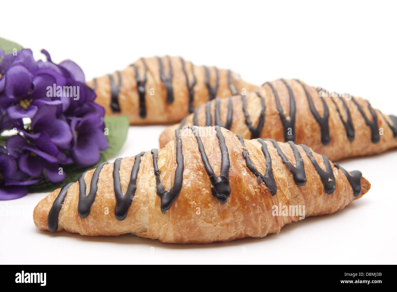 Croissant with flower Stock Photo - Alamy