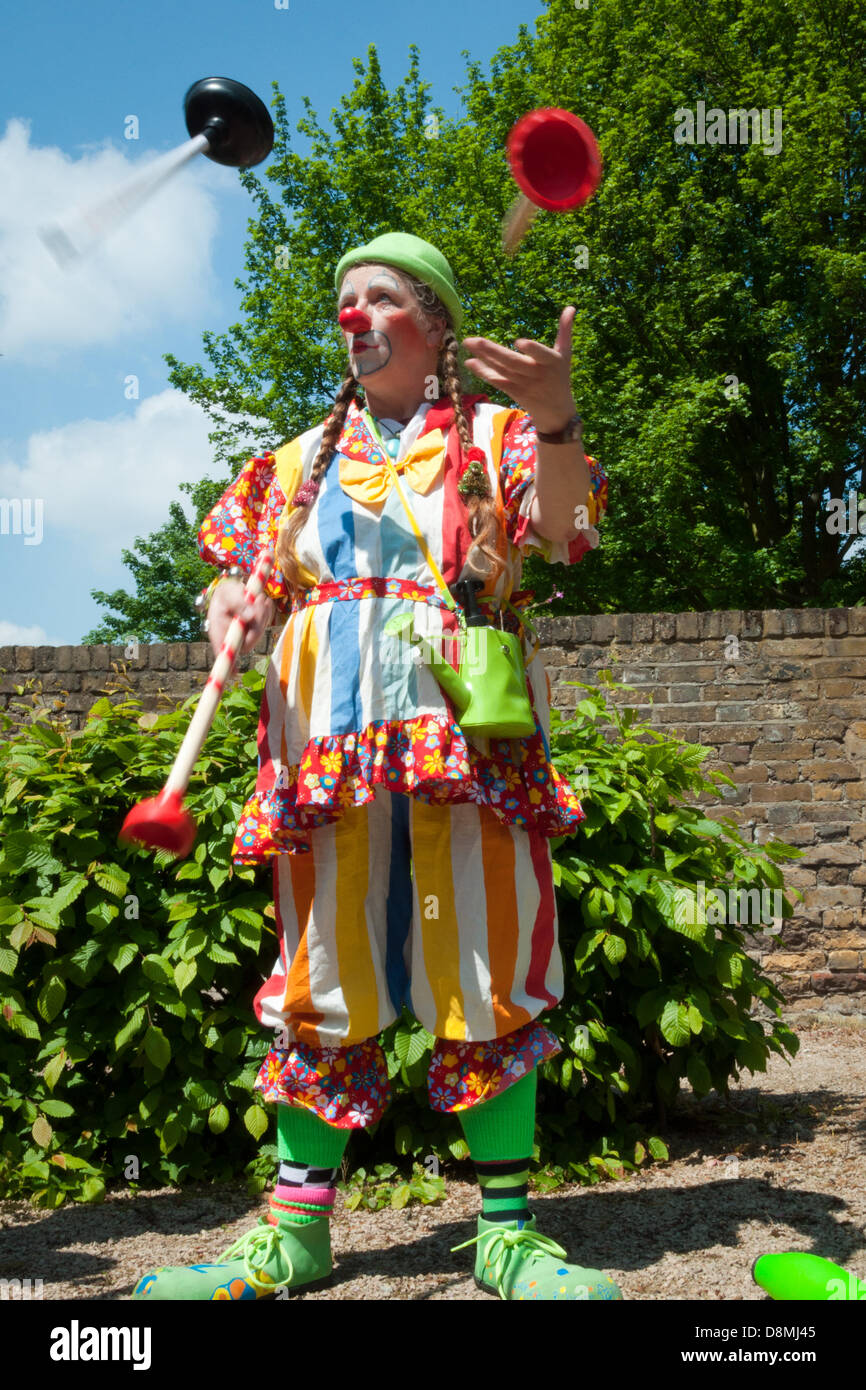 London, England UK. 31st May 2013. Clown Susi Oddball juggles in Joseph ...