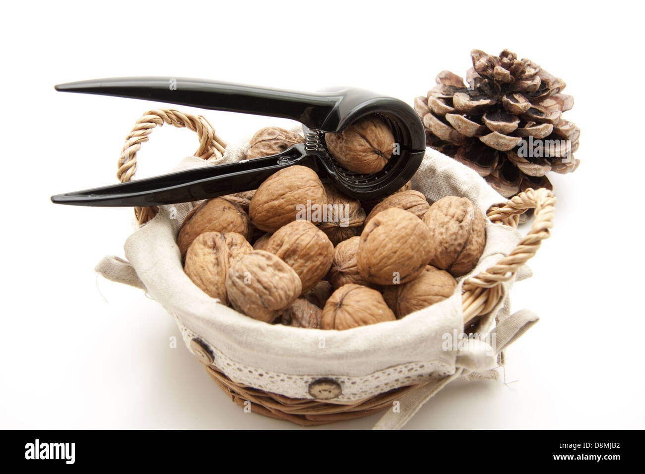 Walnuts with nutcracker Stock Photo - Alamy