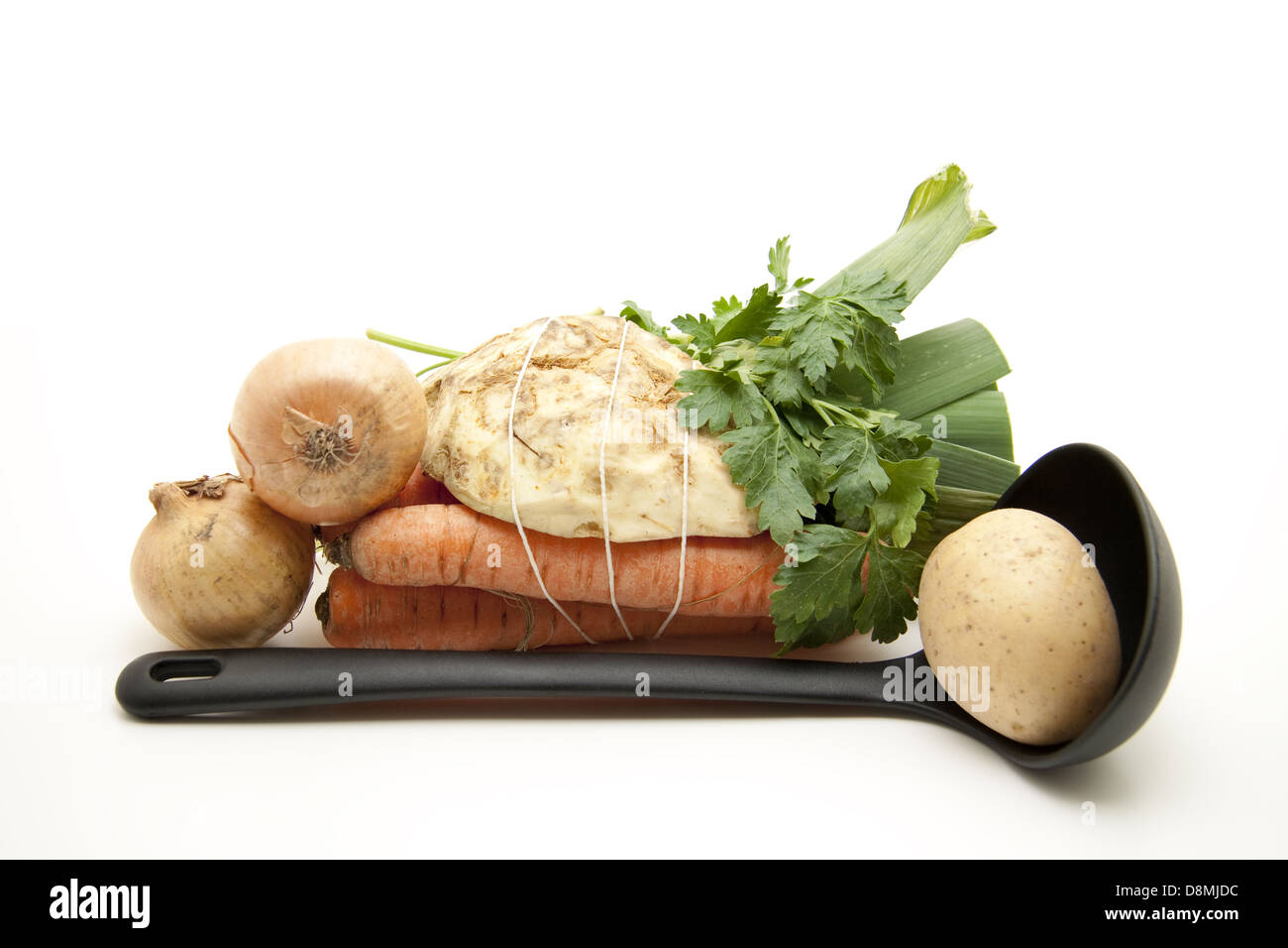 Ladle with soup vegetables Stock Photo - Alamy