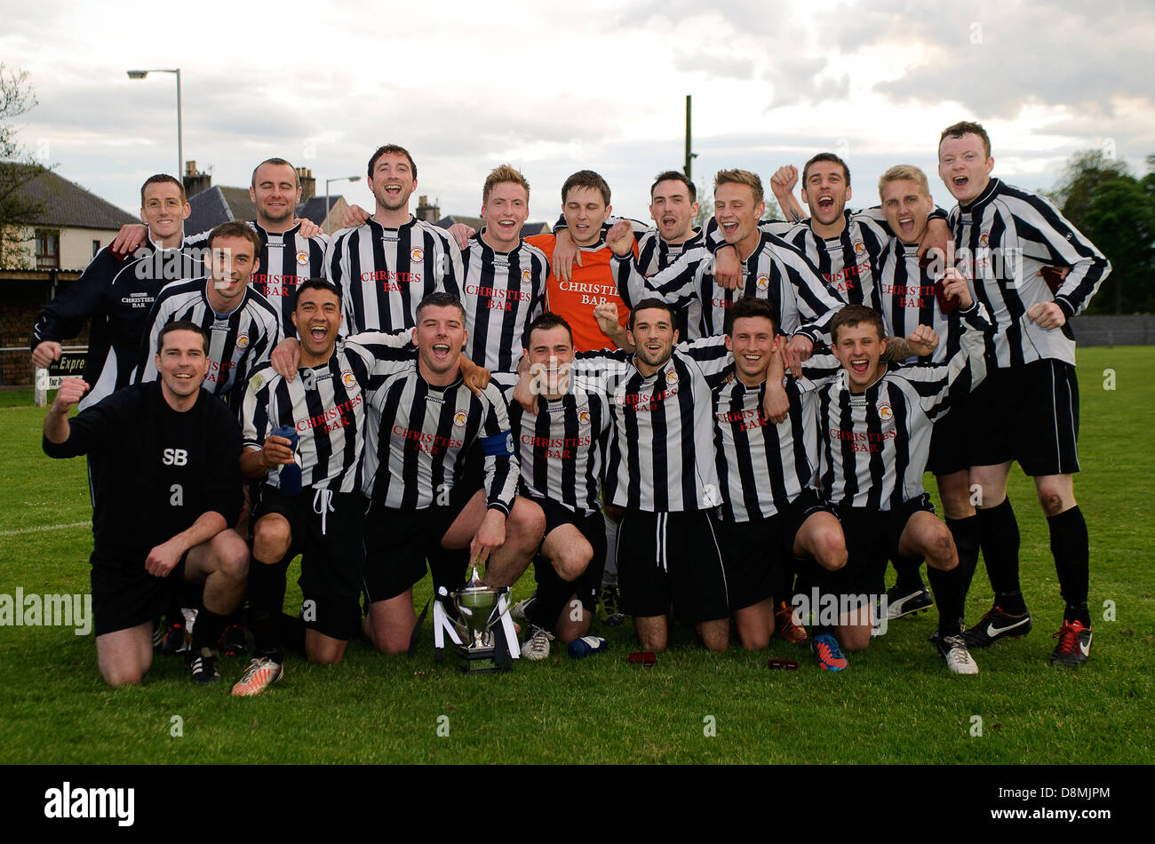 Jeanfield Swift players celebrate winning the ACA Cup Fife Final Stock ...