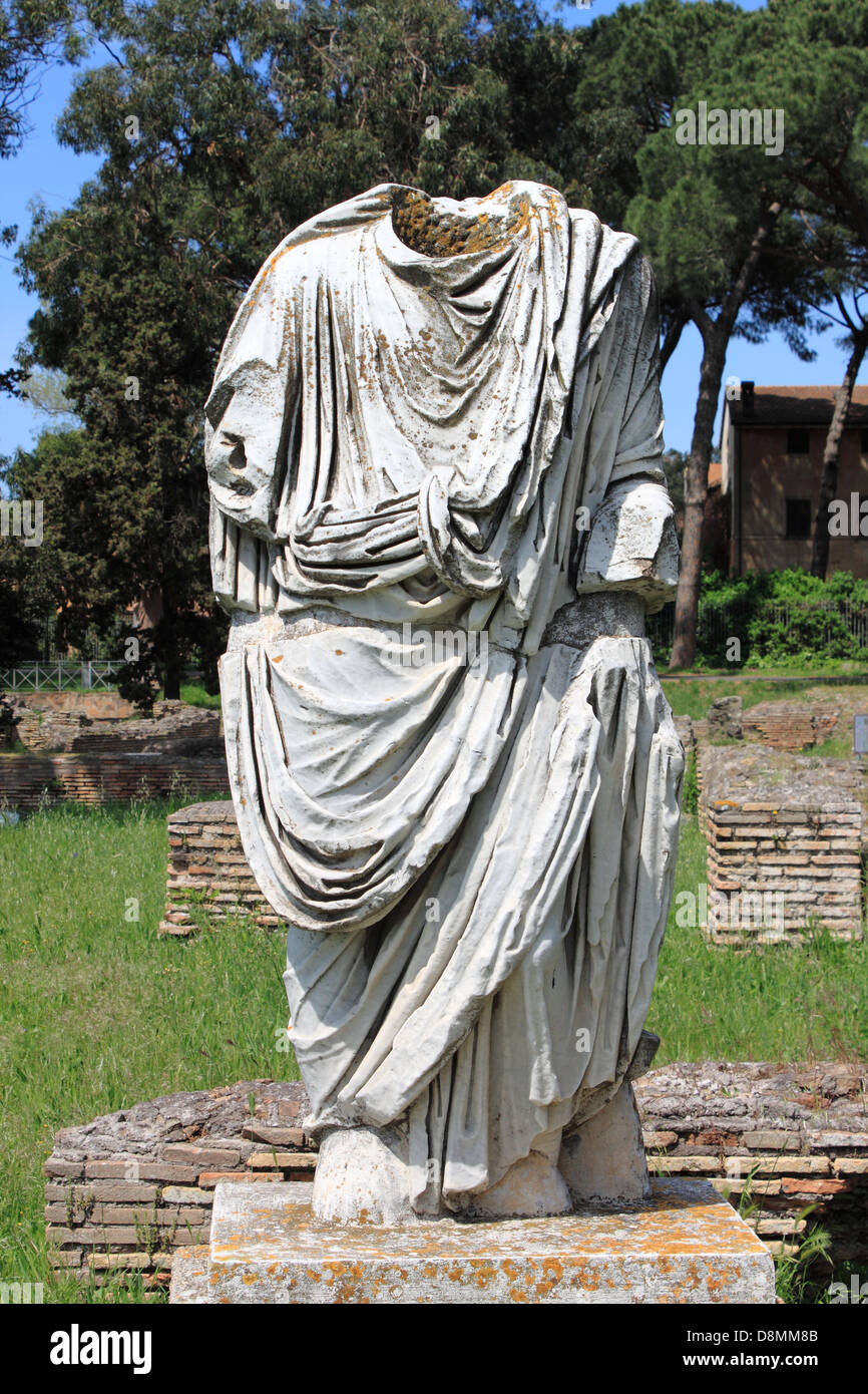 Beheaded statue of a roman senator in Ostia Antica, the old harbour of ...