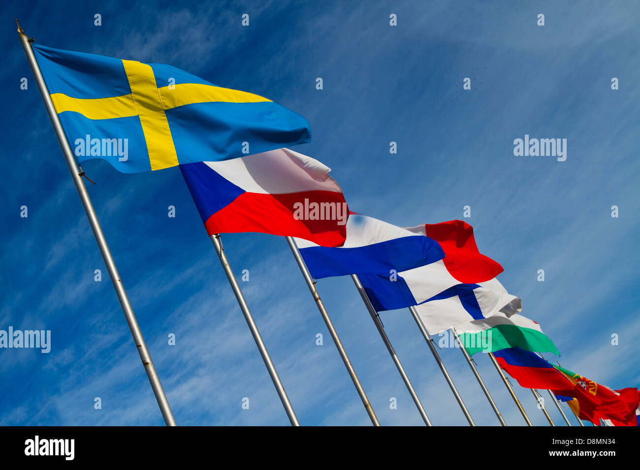 European flags against blue sky Stock Photo - Alamy