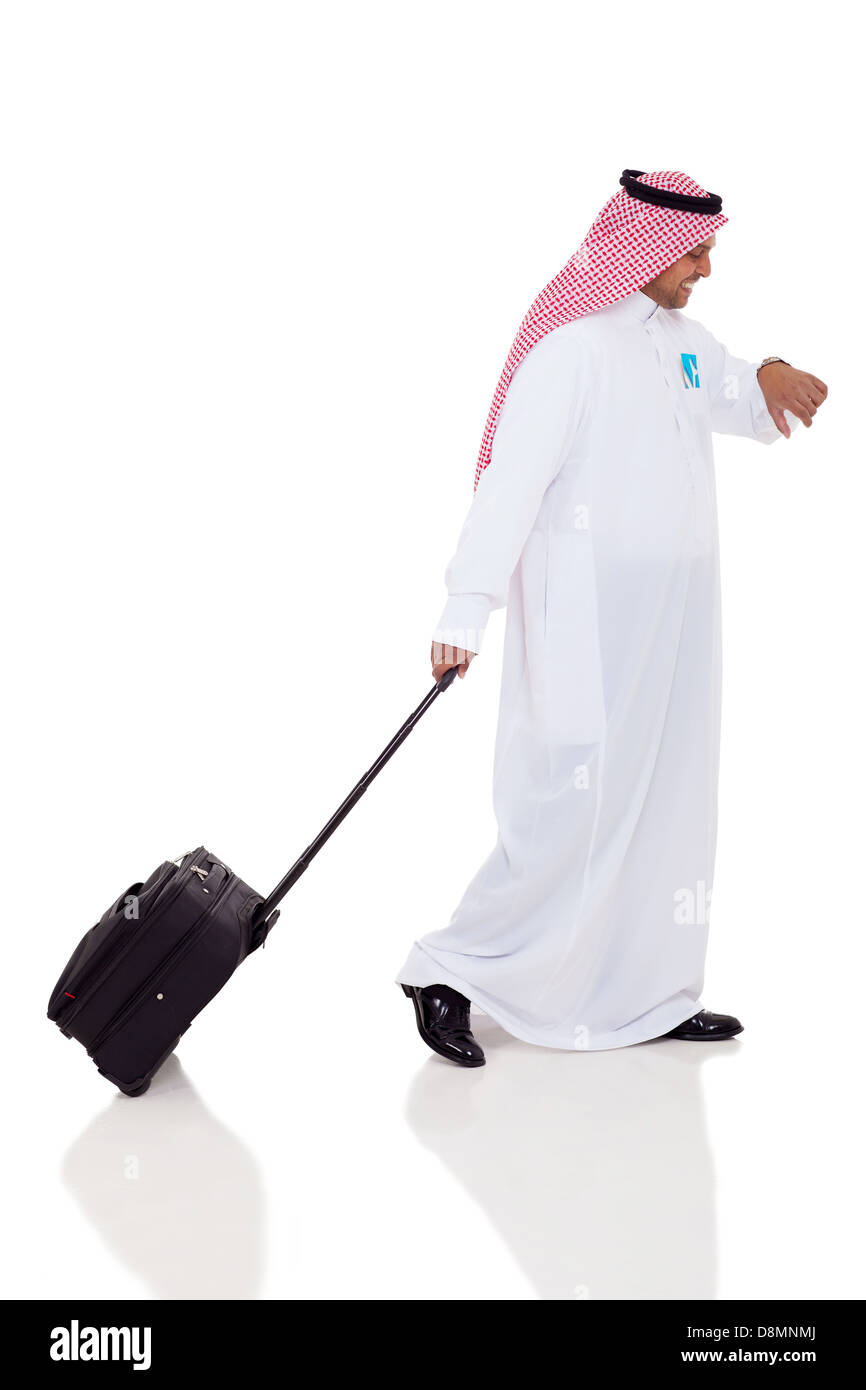 arabic business traveler checking time Stock Photo - Alamy