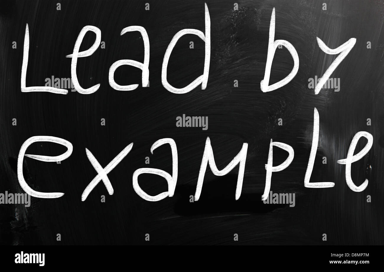 Lead by example handwritten with white chalk on a blackboard Stock ...