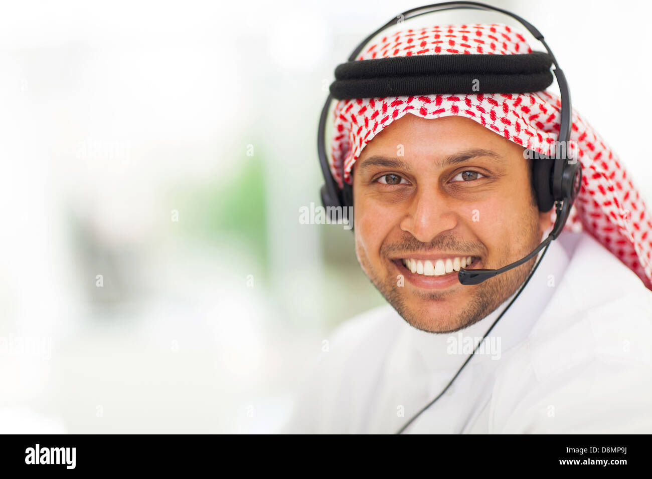 arabic business man with headphone in office Stock Photo - Alamy