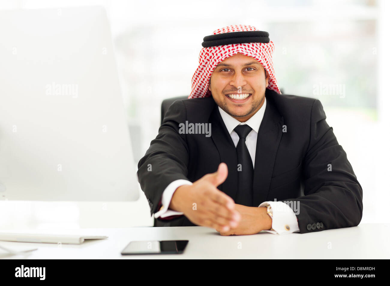 friendly arabic businessman giving handshake gesture Stock Photo - Alamy friendly arabic businessman giving handshake gesture Stock Photo - Alamy