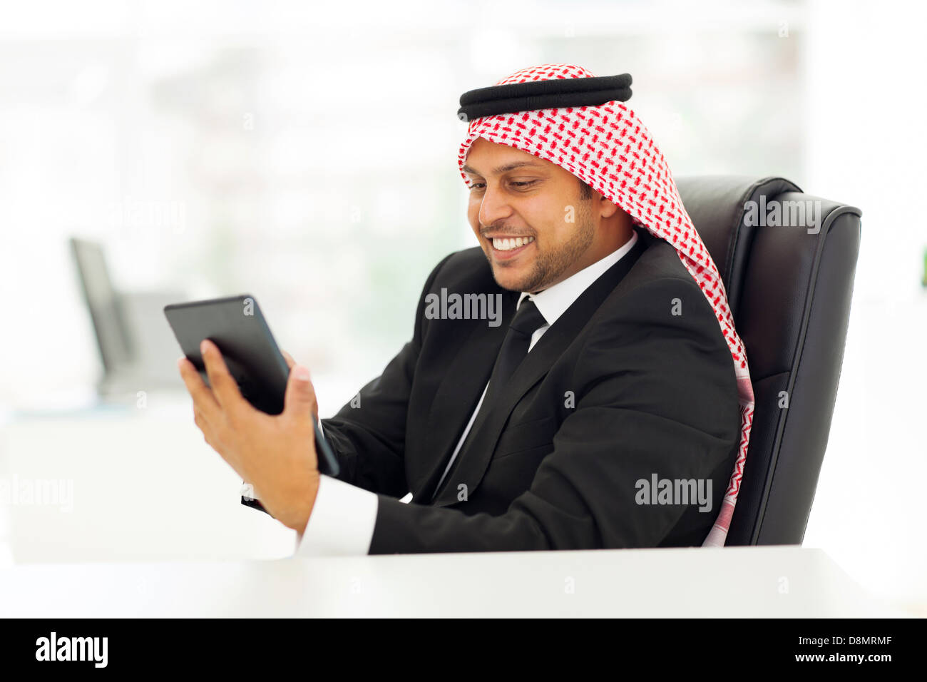 Muslim man smiling suit hi-res stock photography and images - Alamy