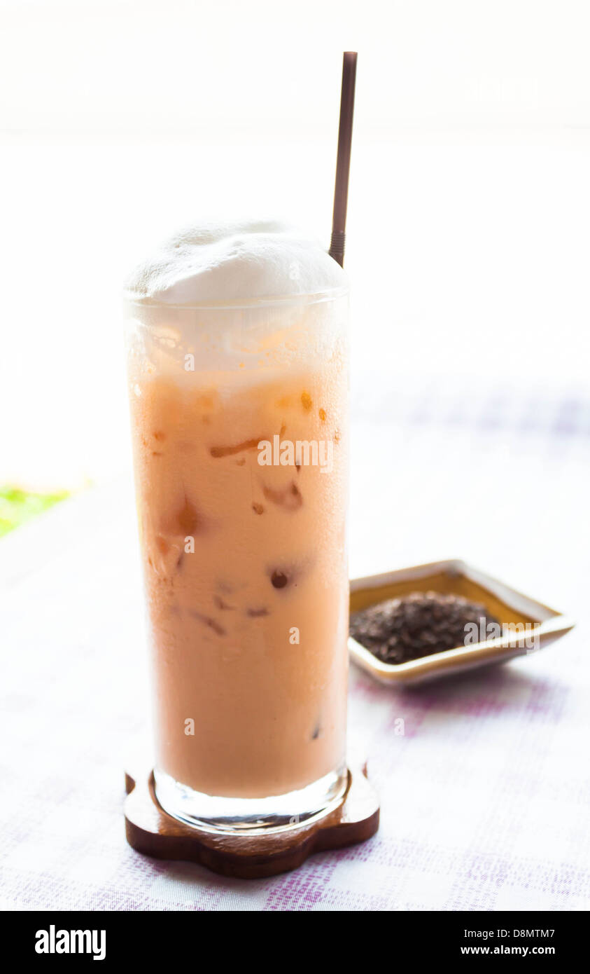 A glass of cold thai milk tea Stock Photo - Alamy