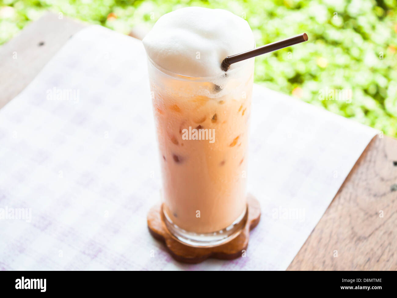 Tea time with cold thai milk tea Stock Photo - Alamy