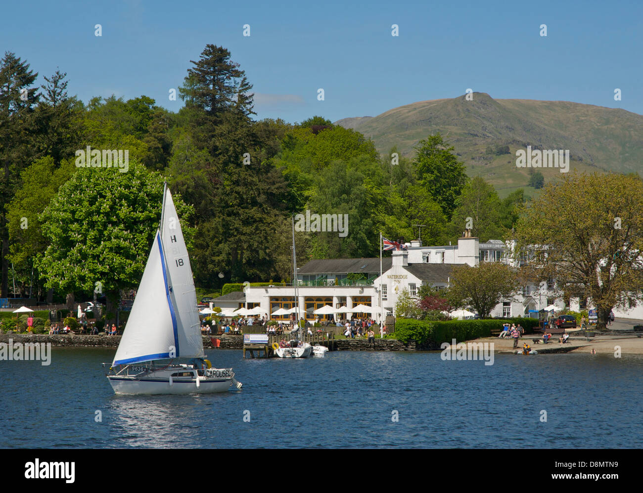 Sailboat passing the Wateredge Inn, Waterhead, Lake Windermere, Lake ...