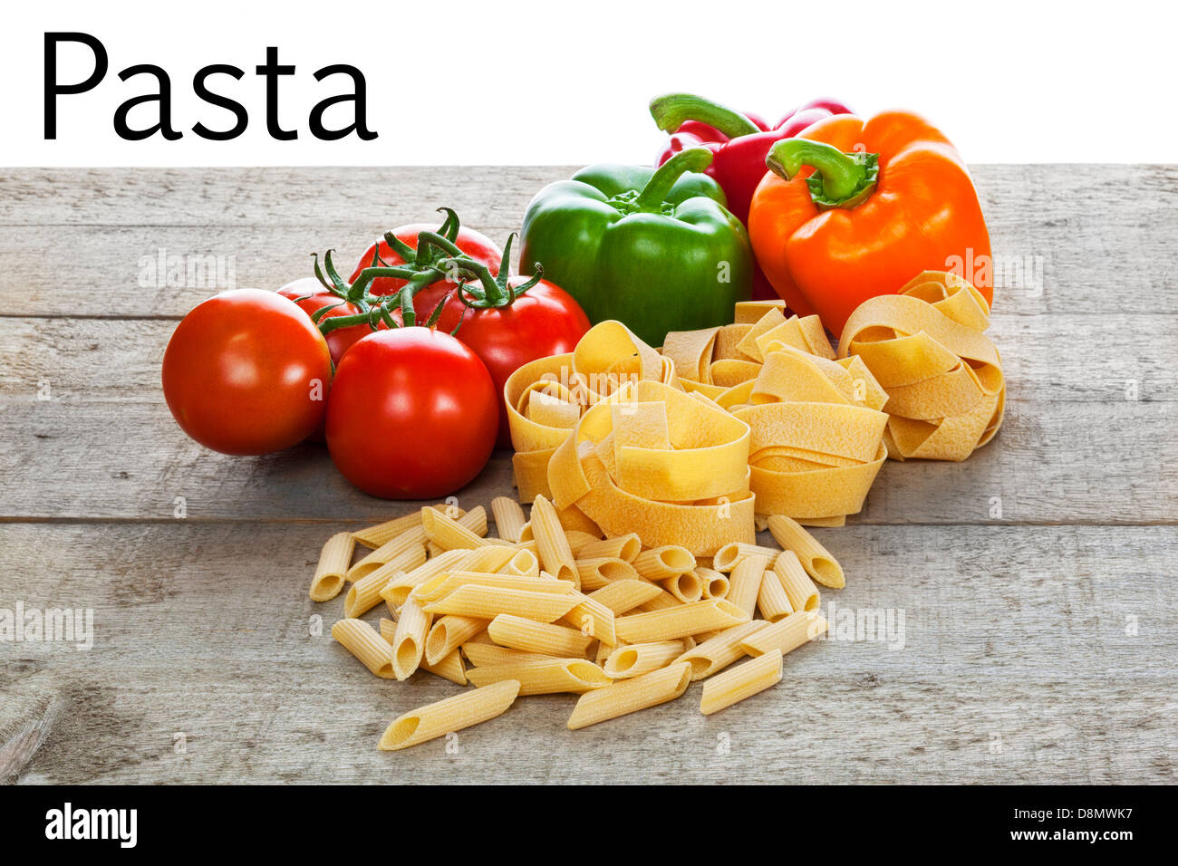 Pasta and Vegetables on Rustic Background - raw bronze die pasta and ...