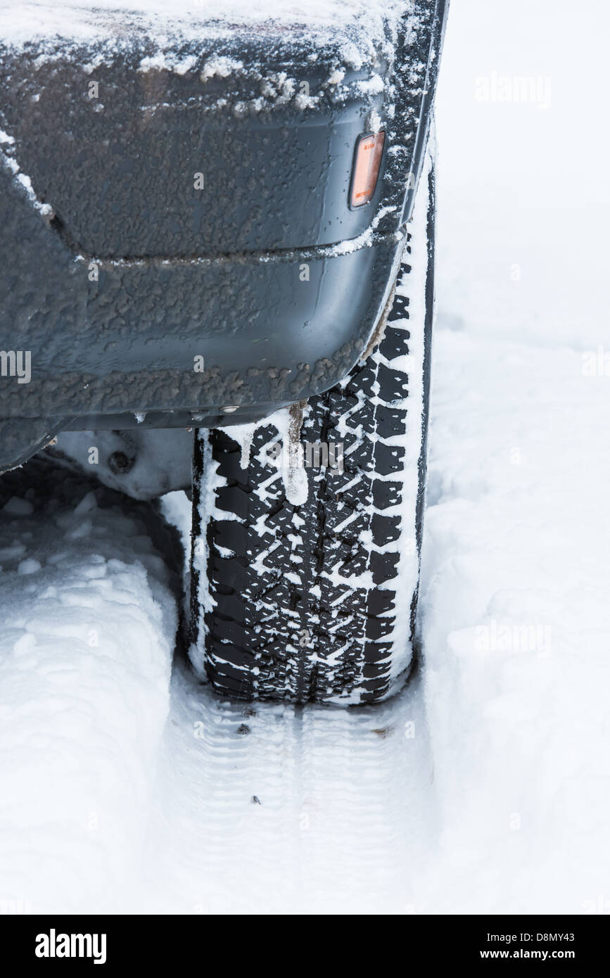 wheel in the snow Stock Photo - Alamy