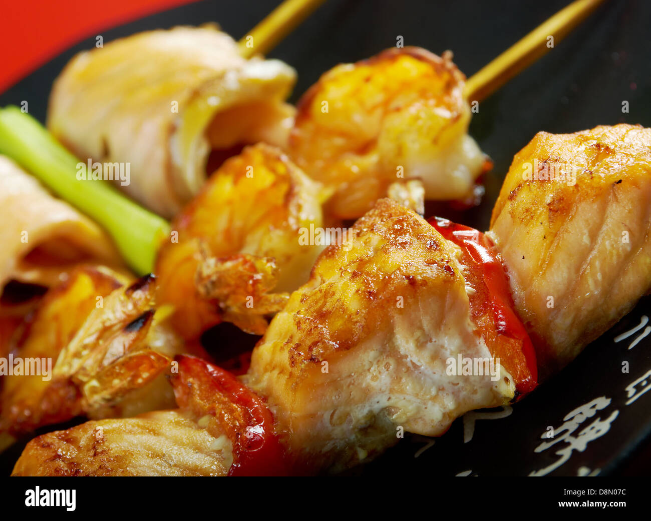 Japanese skewered seafoods Yakitori Stock Photo - Alamy