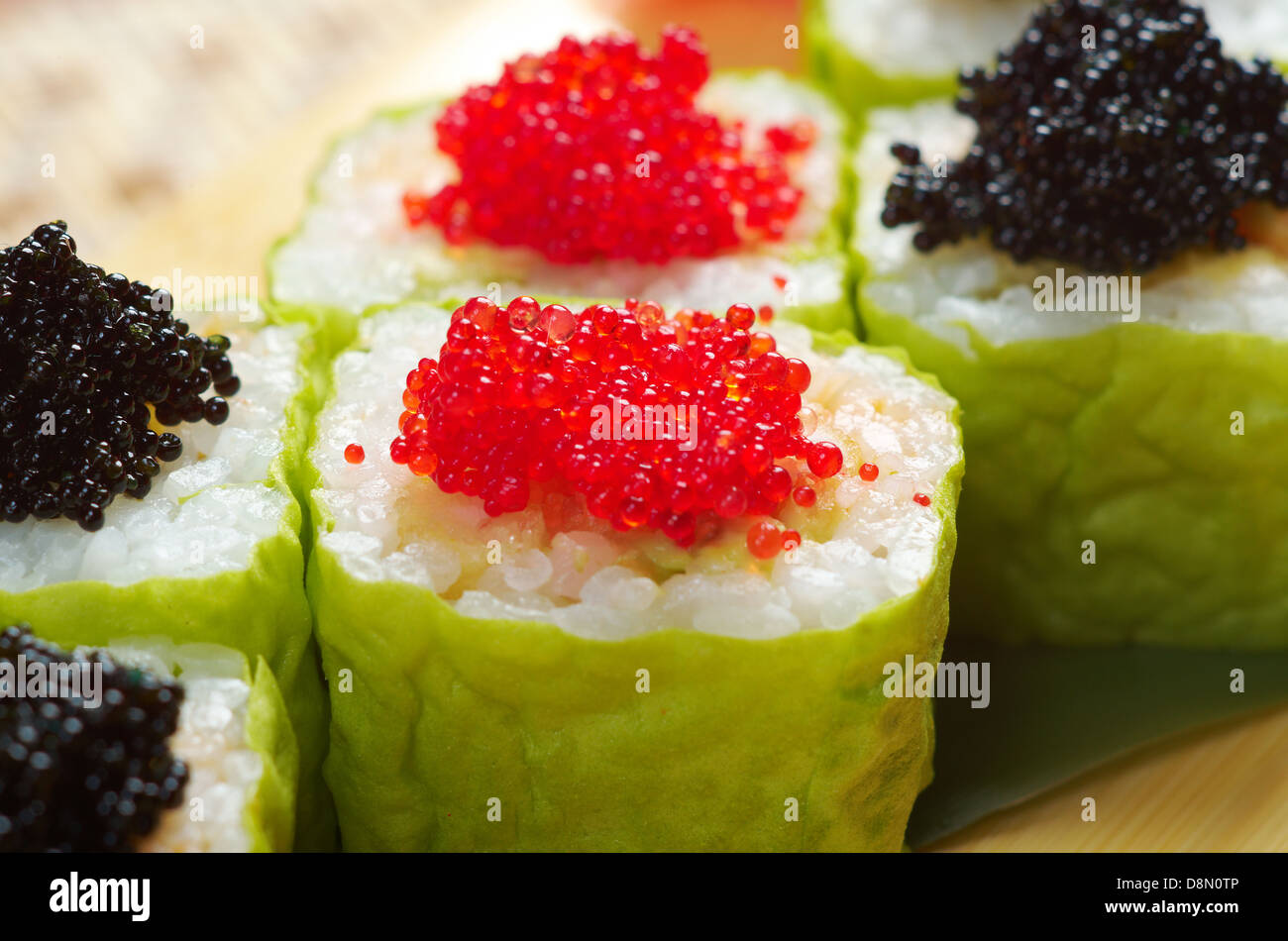 Roll made of Smoked fish and roe Stock Photo - Alamy