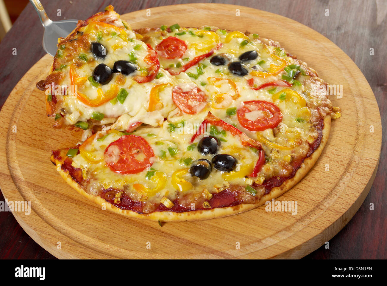 taking slice of pizza,melted cheese dripping Stock Photo - Alamy