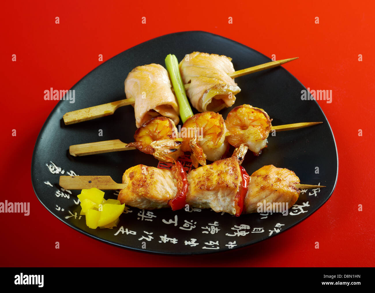 Japanese skewered seafoods Yakitori Stock Photo - Alamy