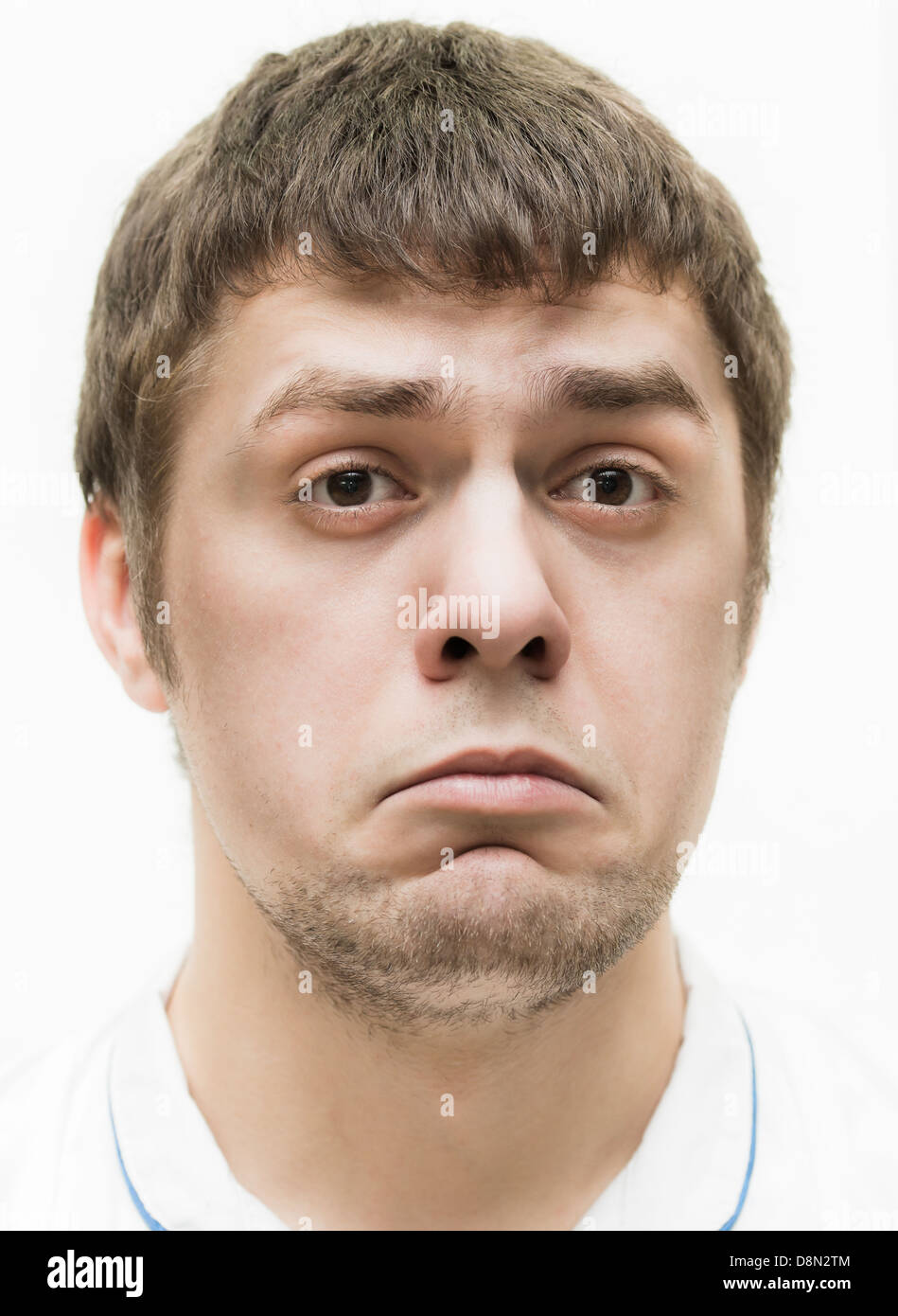 grimace on his face Stock Photo - Alamy