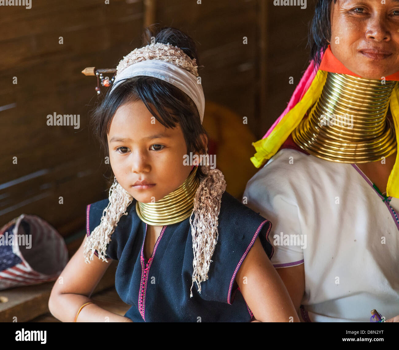 Karen Padong tribeswoman and daughter in a village near Chiang Rai ...