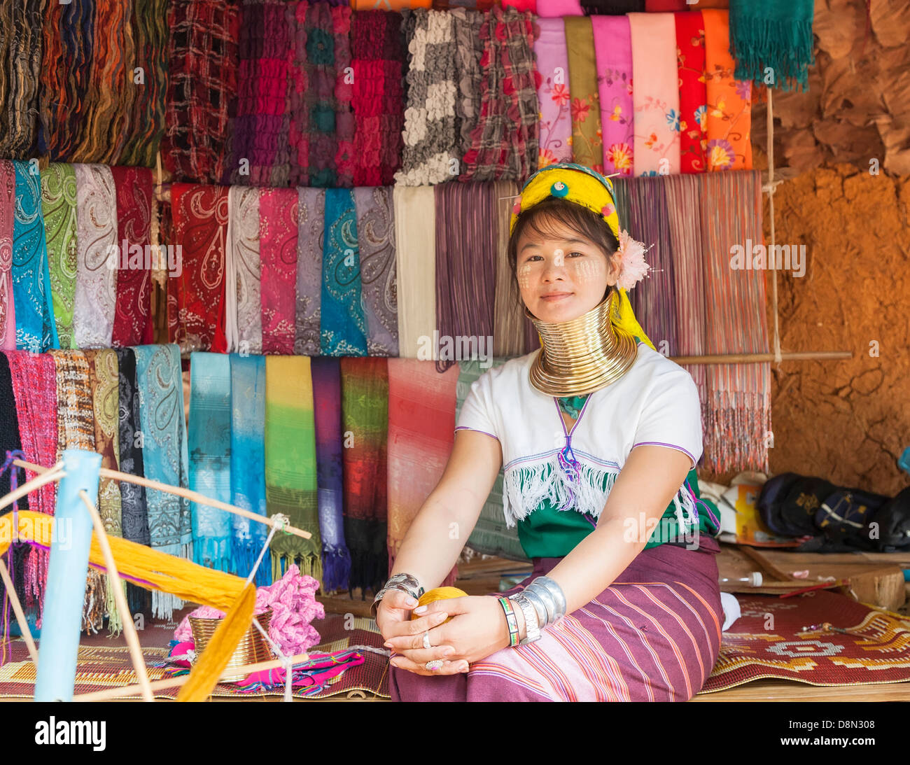 Karen Padong tribeswoman in a souvenir shop in a village near Chiang ...