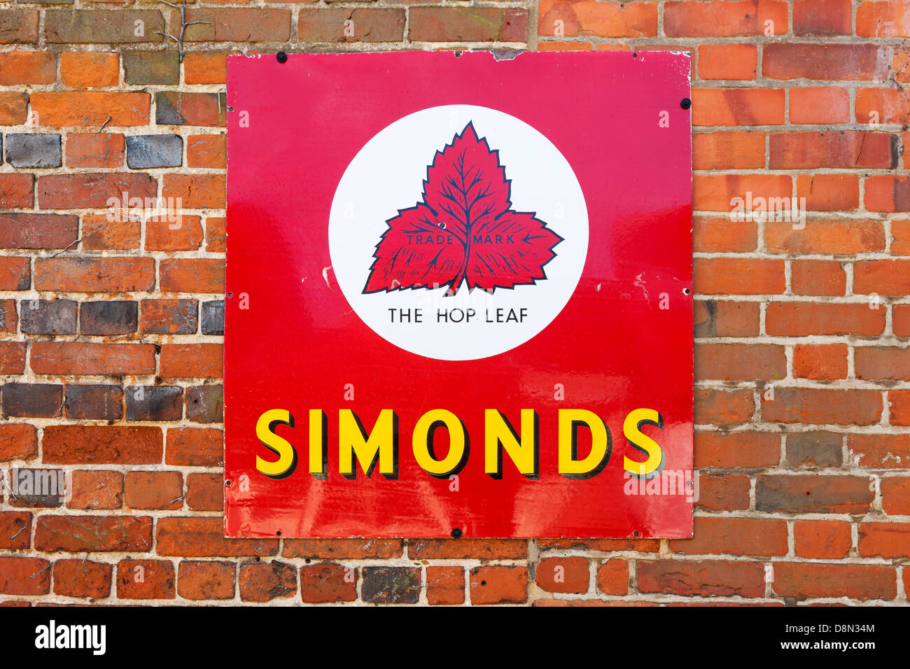 Vintage enamel advertising sign - Simonds Hop Leaf brand Stock Photo ...