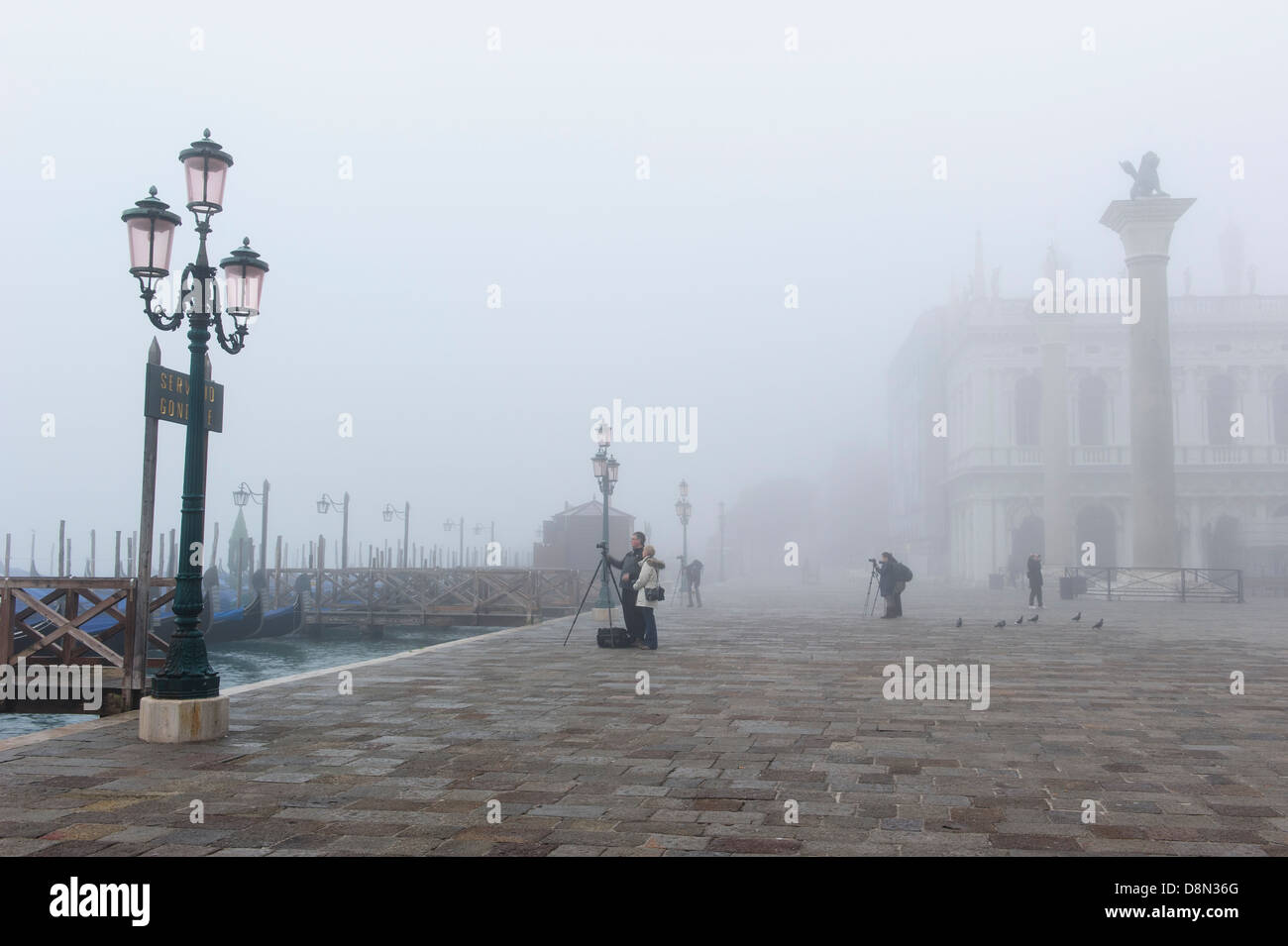 Photographers around the Venice waterfront covered in thick fog, Venice ...