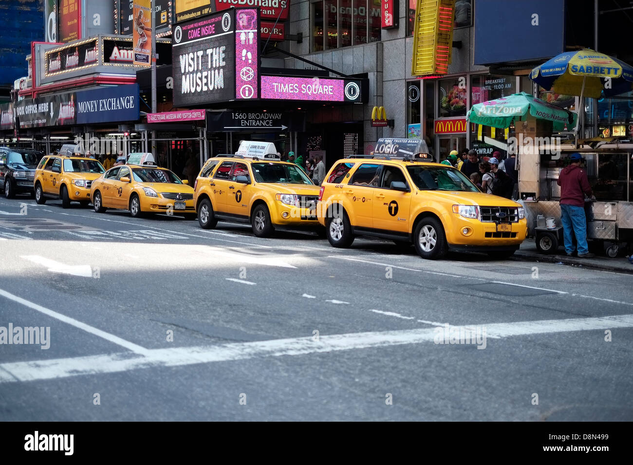 New York City yellow taxis, Times Square in Midtown Manhattan Stock ...