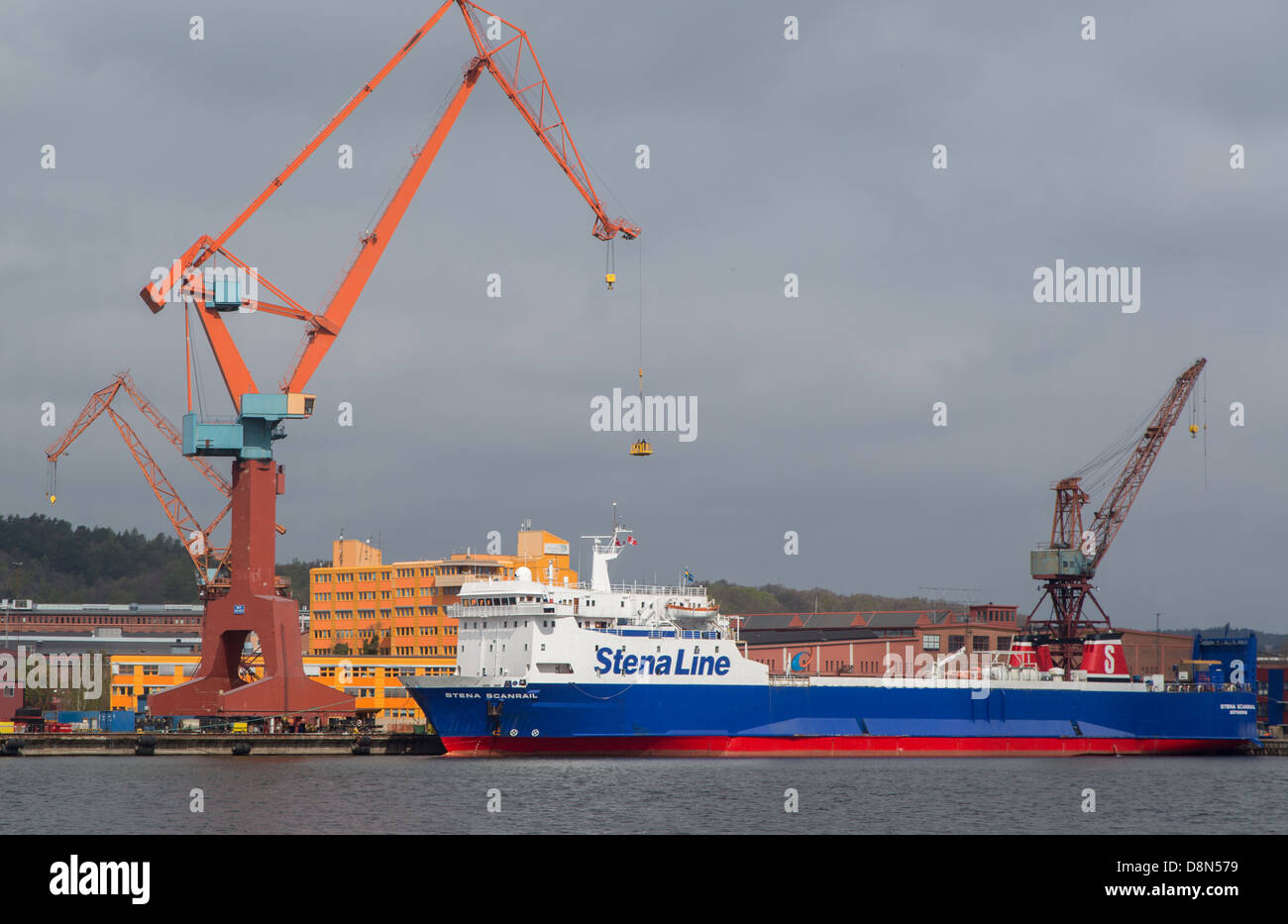 Industrial cranes at a shipyard and floating dry dock in Gothenburg ...