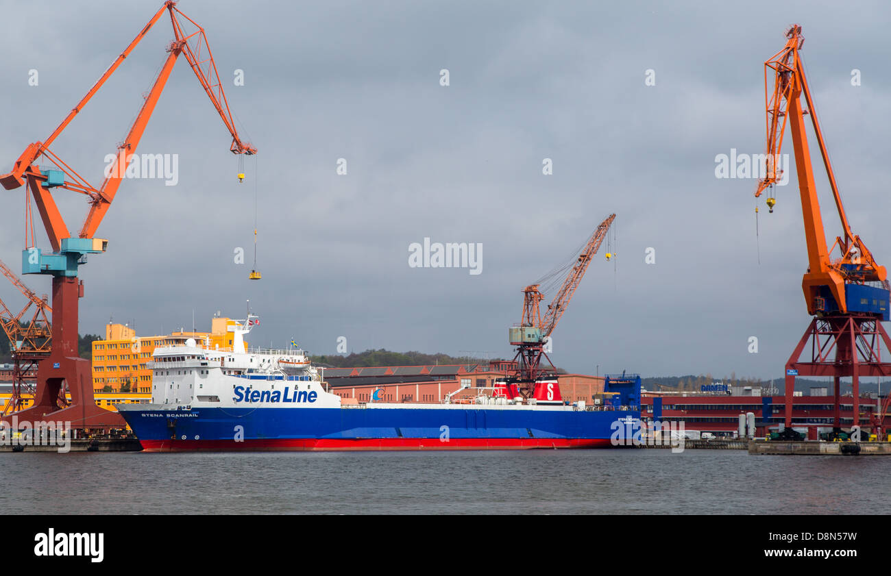 Industrial cranes at a shipyard and floating dry dock in Gothenburg ...