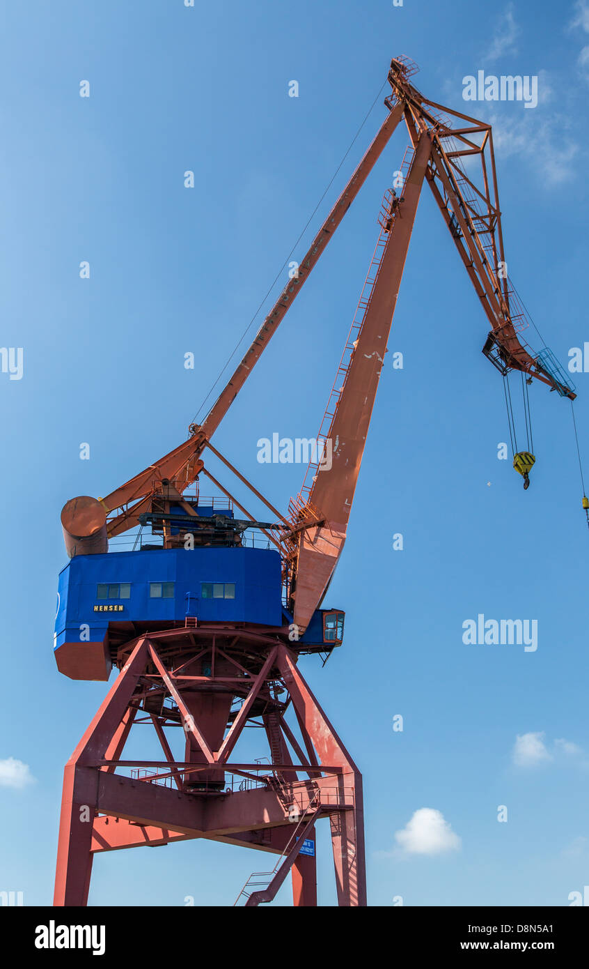 Industrial cranes at a shipyard and floating dry dock in Gothenburg ...