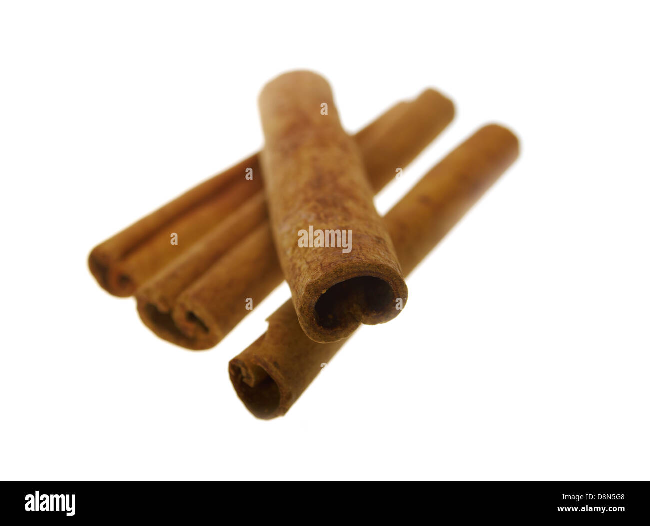 Cinnamon sticks isolated Stock Photo - Alamy