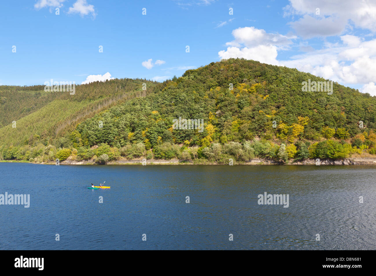 Kayaks on Lake Rursee with blue sky and sunlight in summer Stock Photo ...