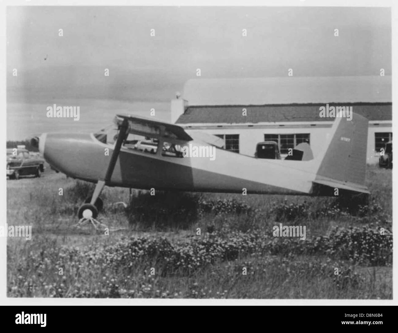 A vintage photograph of an old plane, capturing the details of early ...