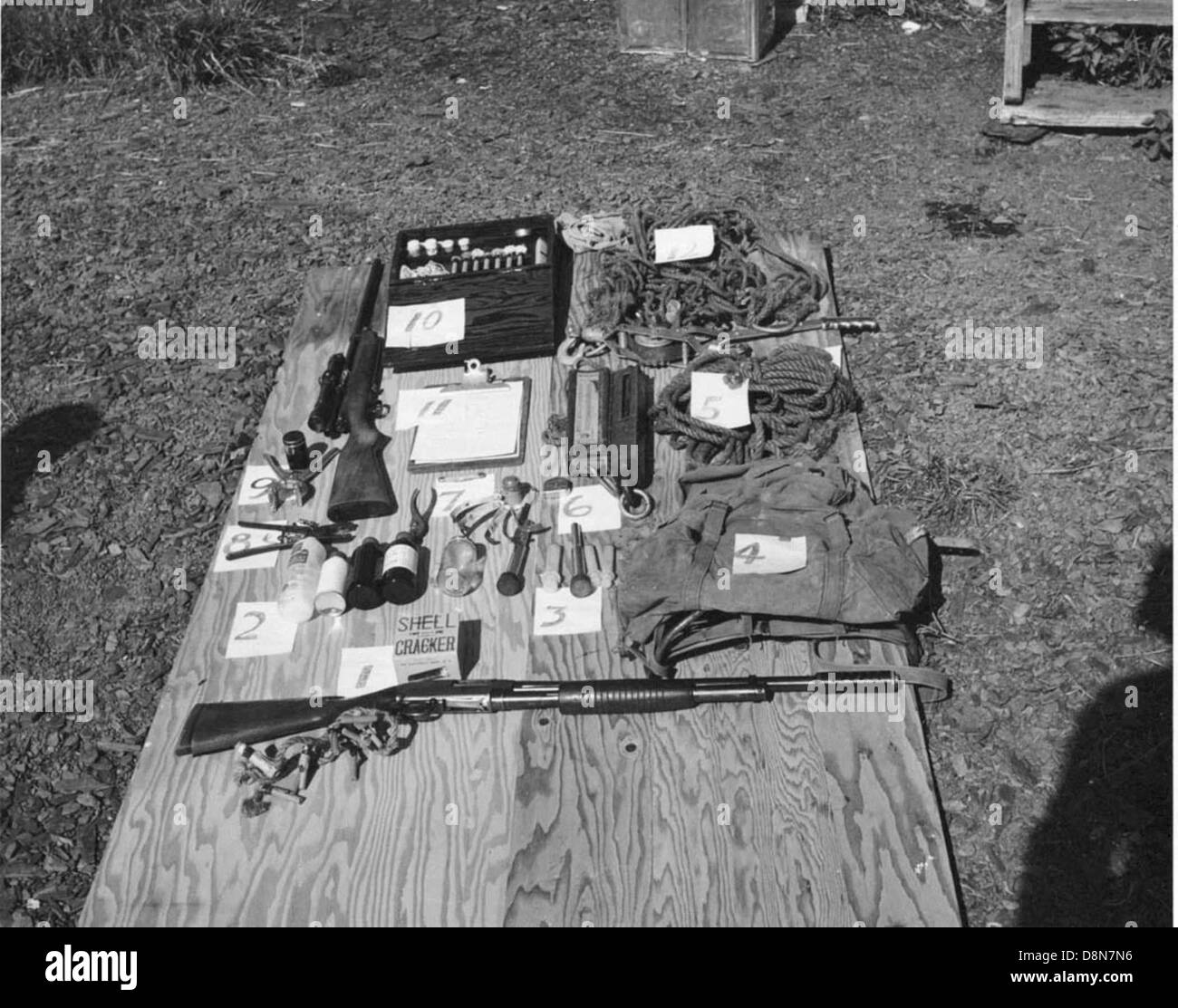 Various hunting and tagging equipment used for wildlife monitoring and ...