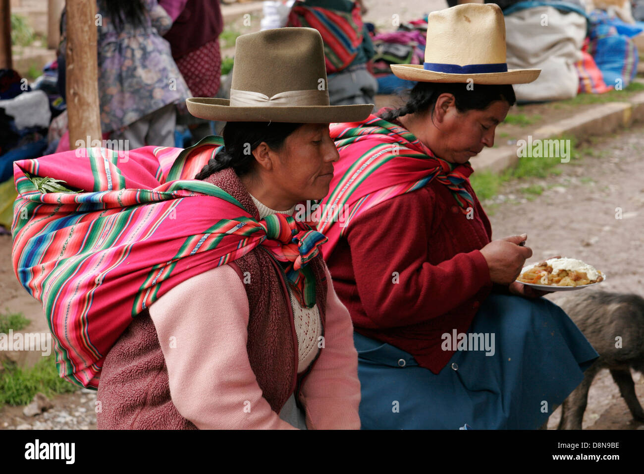 Quechua women on traditional indigenous Sunday market in Chinchero near ...