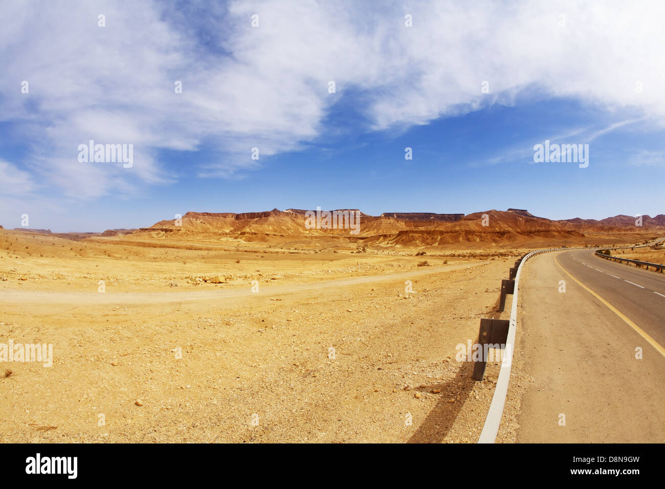 The bright sun in stone desert Stock Photo - Alamy