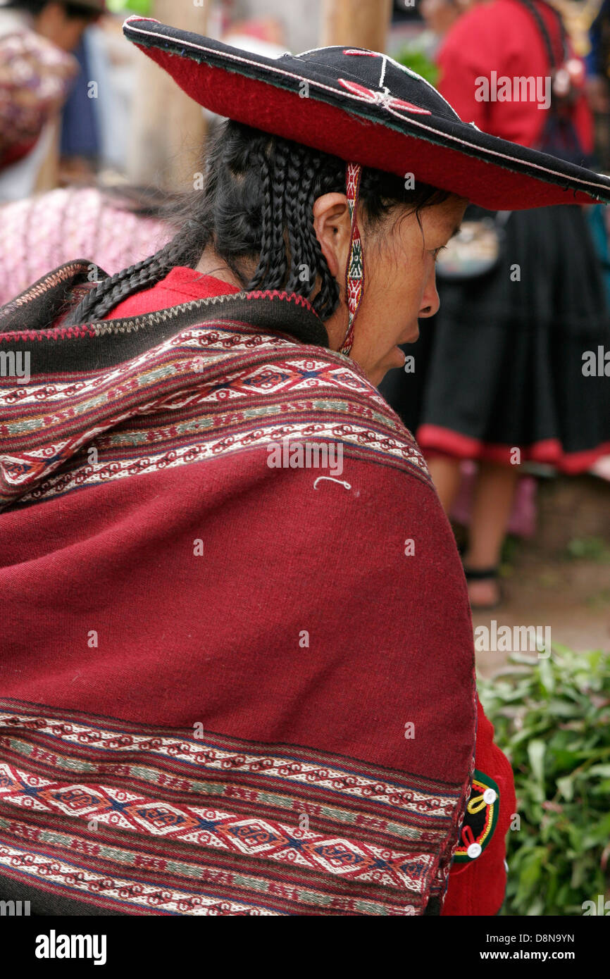 Quechua woman dressed in traditional round hat on indigenous Sunday ...