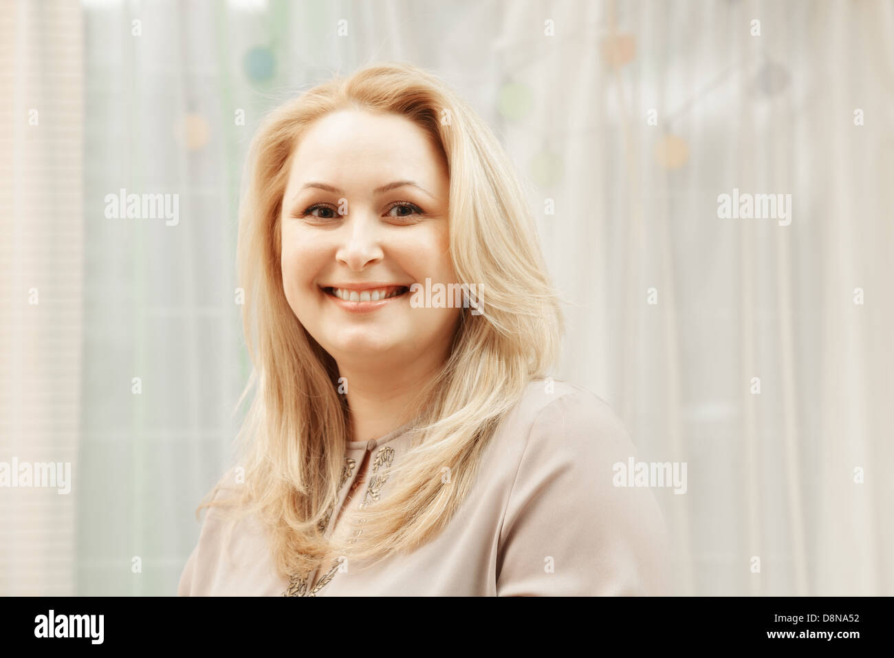 Smiling middle-aged blonde Stock Photo - Alamy Smiling middle-aged blonde Stock Photo - Alamy