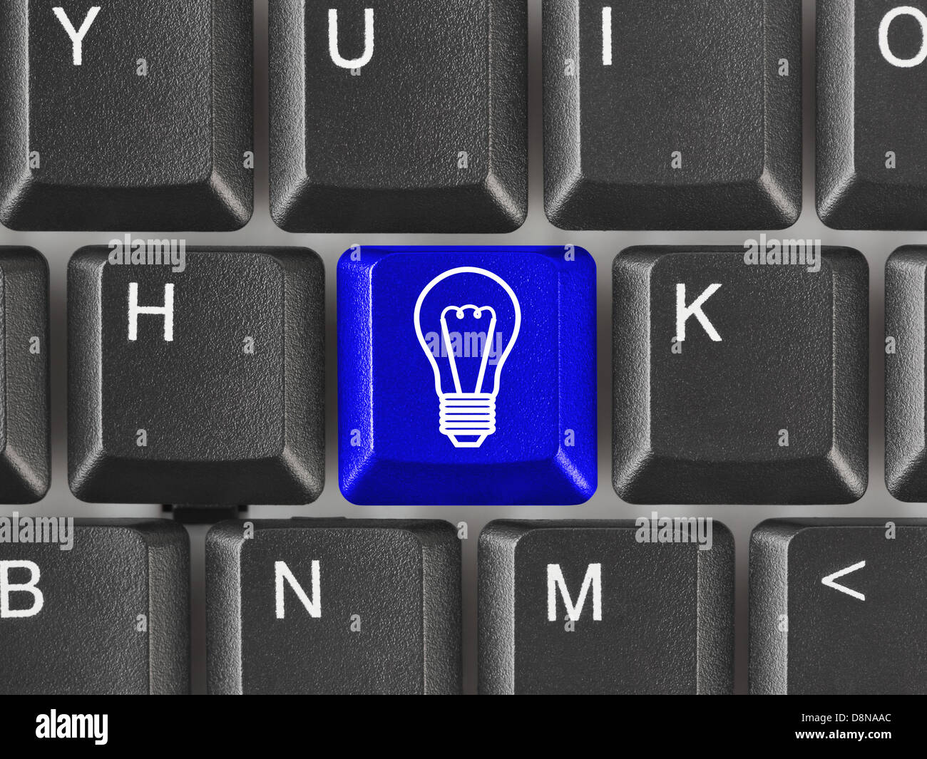 Computer keyboard with lamp key Stock Photo - Alamy