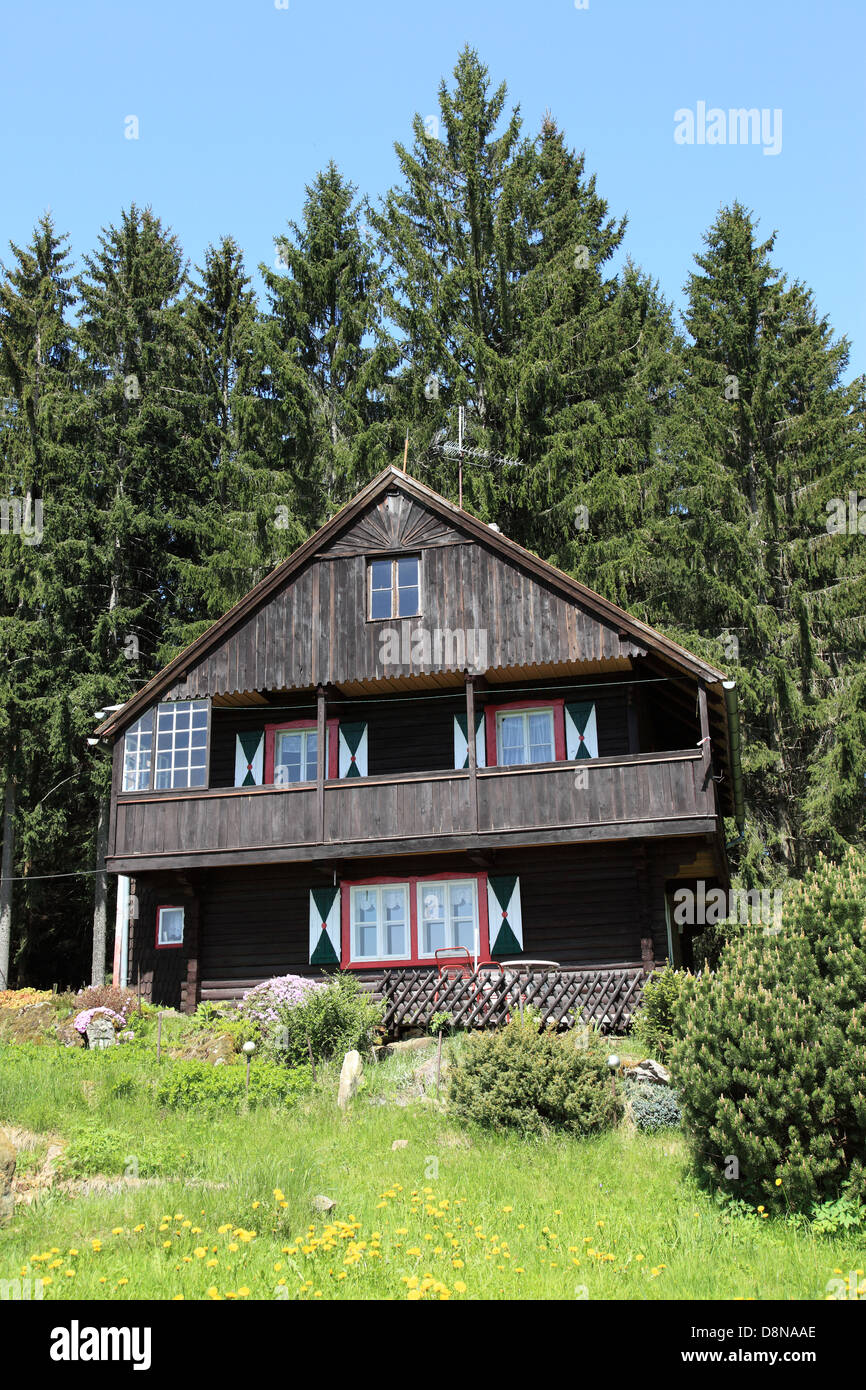 facade of a traditional wooden house at Srni, Czech Republic, Sumava ...