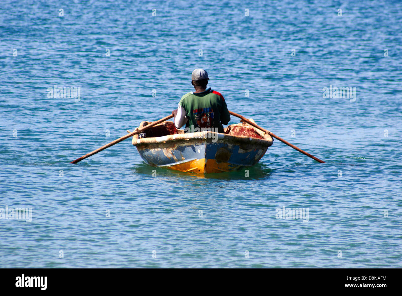 Man boat caribbean hi-res stock photography and images - Alamy