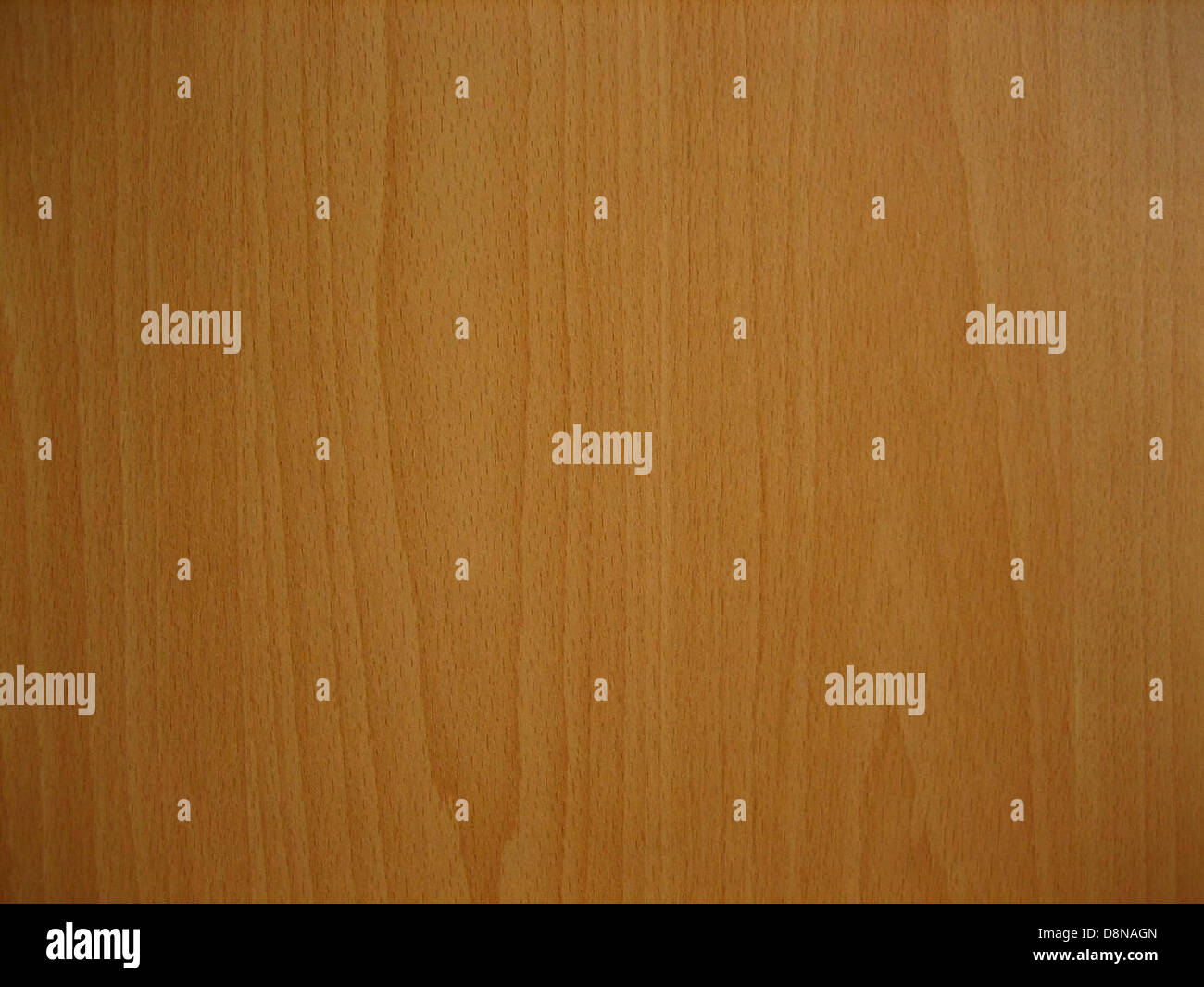 A close-up image of a wood chipboard surface, displaying its rough ...