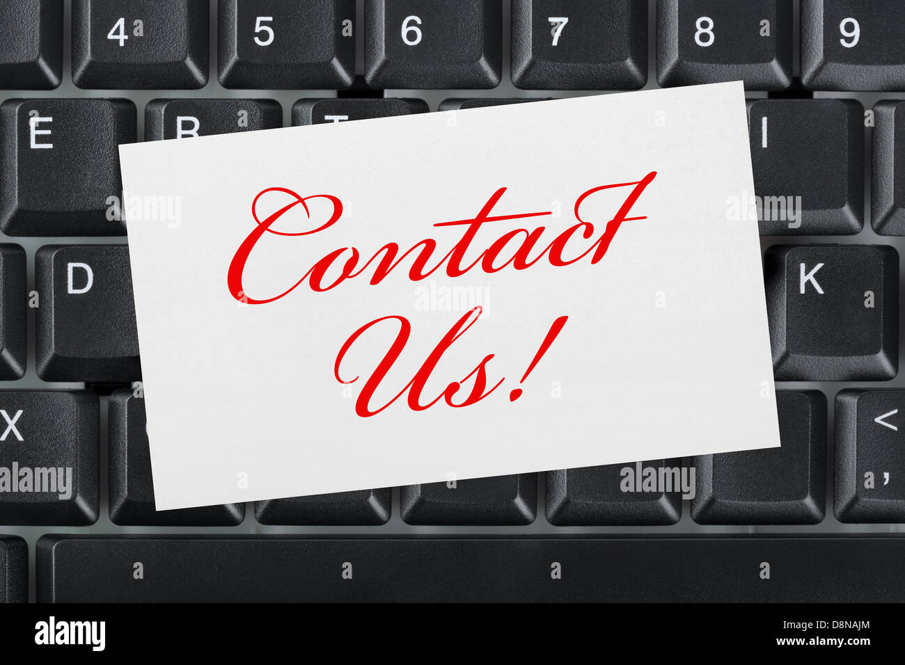 Computer keyboard and card Contact Us Stock Photo - Alamy