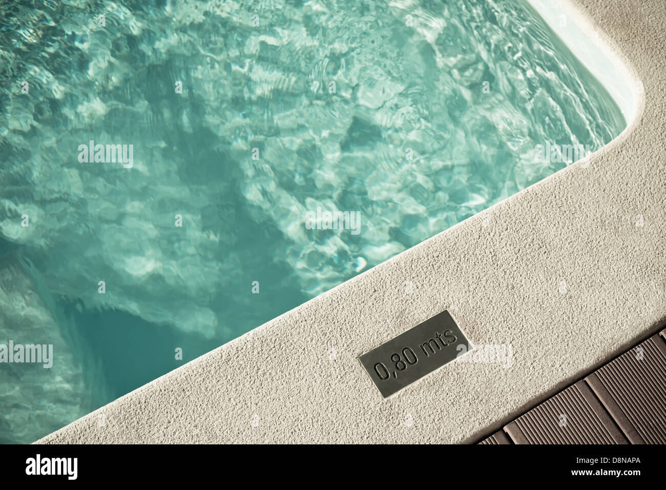 Outdoor Swimming pool with sunlight and shadows Stock Photo - Alamy